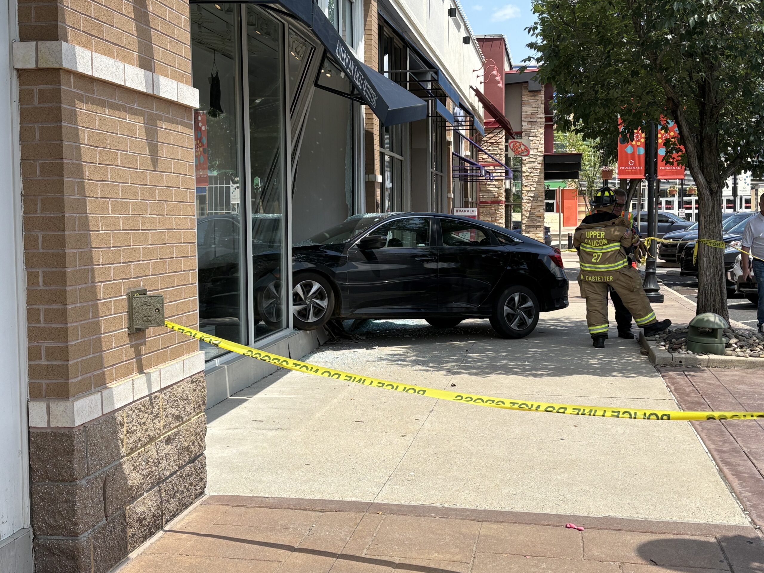 Car crashed into the front of American Eagle in the Promenade Shops ...
